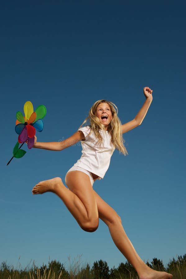 Happy little girl jumping stock image. Image of happiness - 17208691 Happy little girl jumping stock image. Image of happiness - 17208691