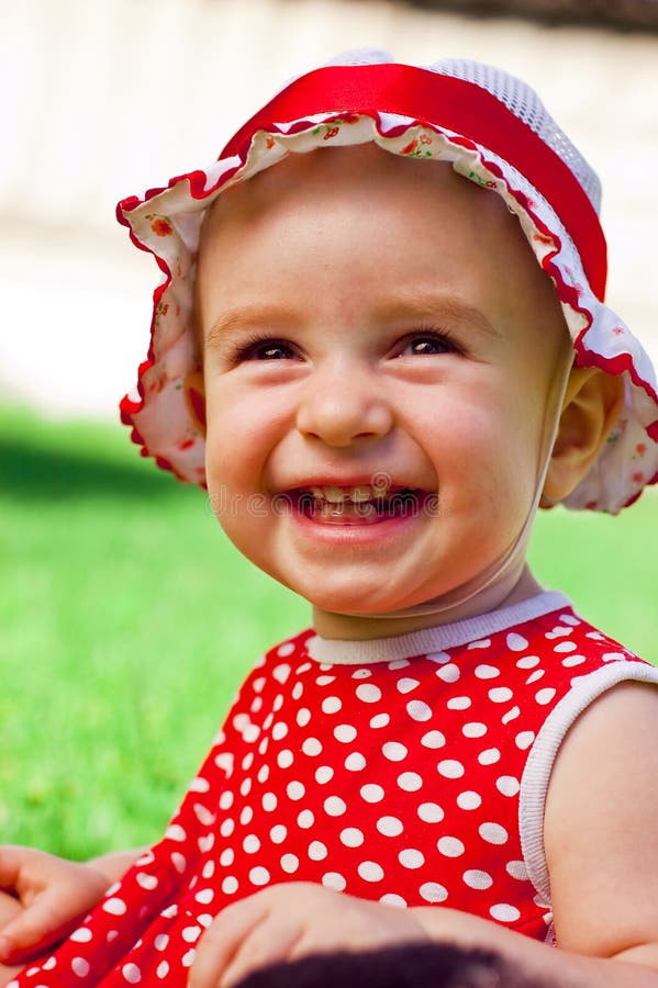 Happy Little Girl on a Lawn Stock Image - Image of family, hope: 23850301