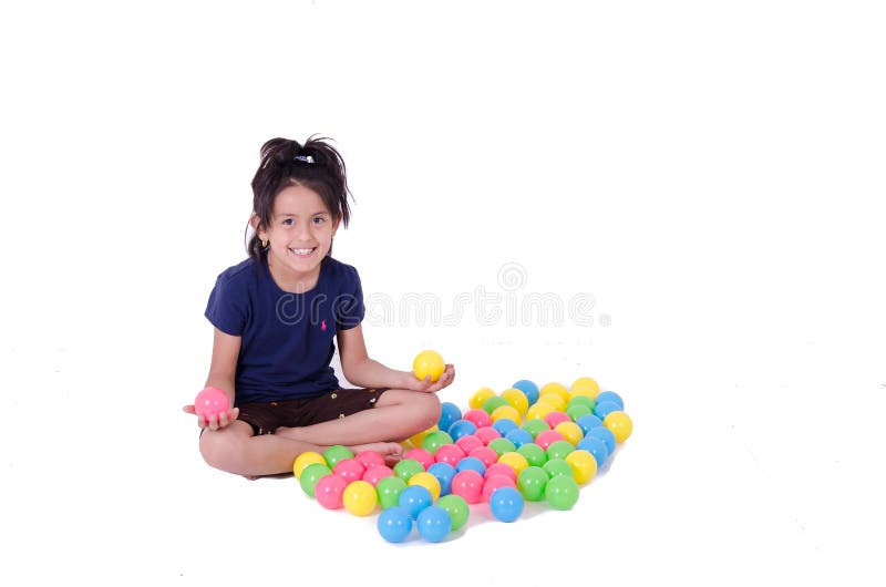 Happy Little Girl Playing with Colourful Balls Stock Photo - Image of ...