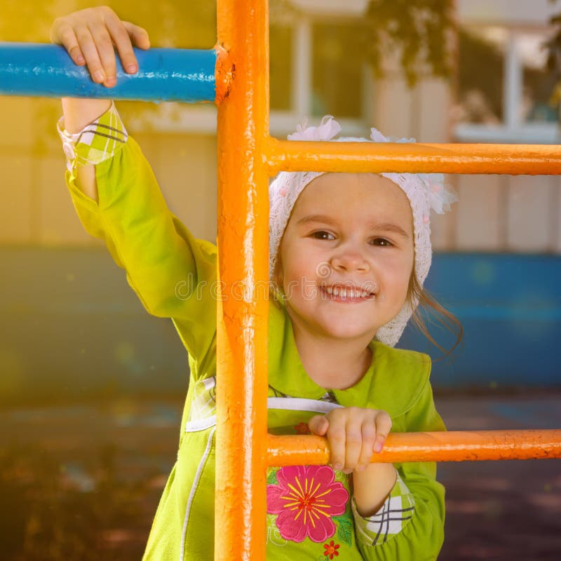 Happy Little Girl Playing on a Playground Stock Photo - Image of play ...