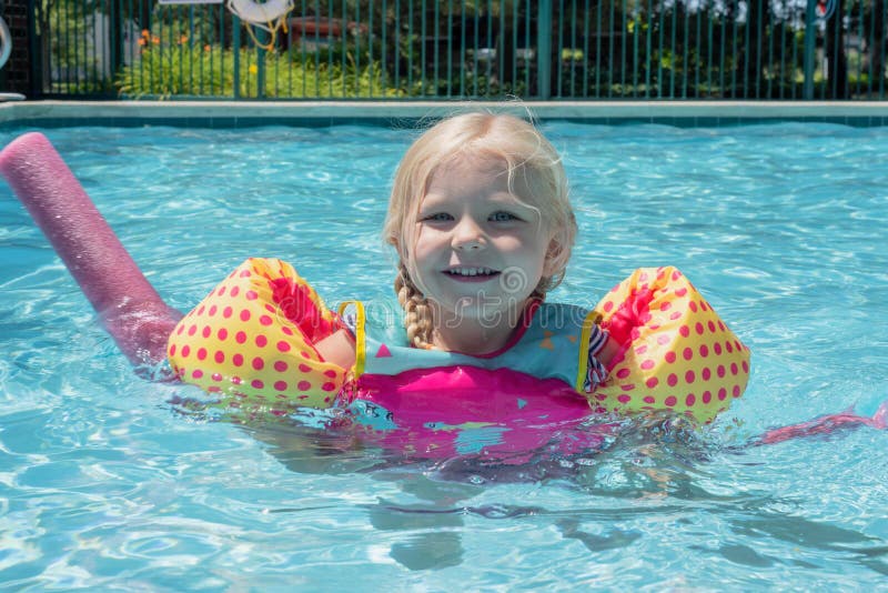 Happy Little Girl Playing at the Pool Stock Photo - Image of lifestyle ...
