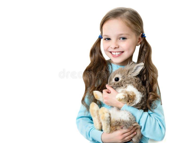 Happy Little Girl with Rabbit Stock Photo - Image of girl, human: 74520306