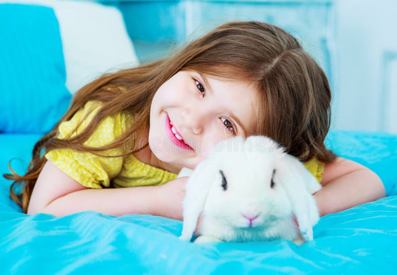 Happy Little Girl with a Rabbit Stock Image - Image of happiness ...