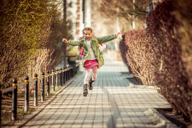 Happy Little Girl Running from School Stock Image - Image of satchel ...