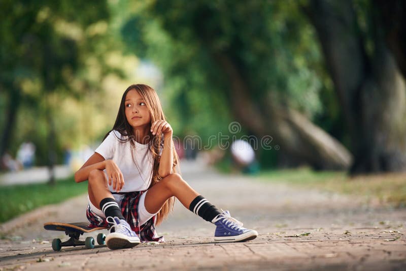 Happy Little Girl with Skateboard Outdoors Stock Photo - Image of ...