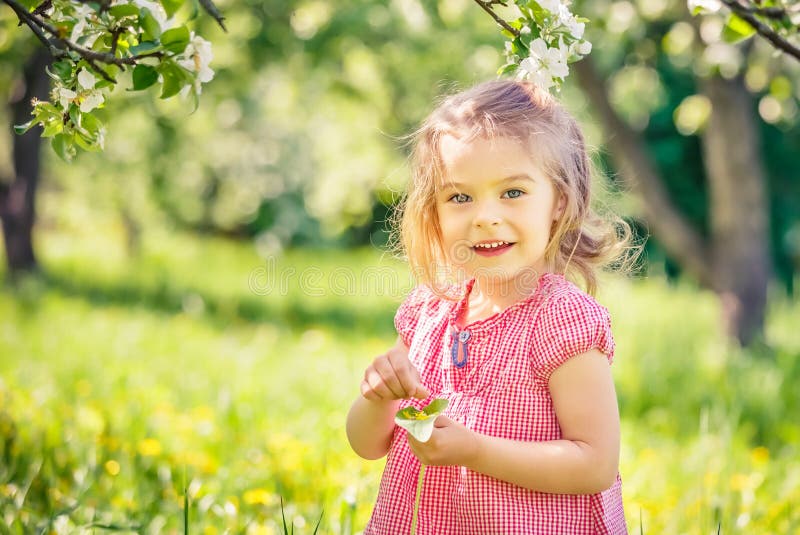 Happy Little Girl in Spring Sunny Park Stock Photo - Image of outdoors ...