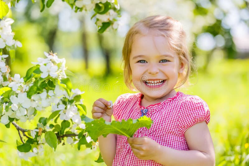Happy Little Girl in Spring Sunny Park Stock Photo - Image of caucasian ...