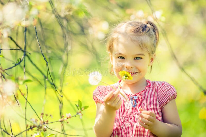 Happy Little Girl in Spring Sunny Park Stock Image - Image of dandelion ...