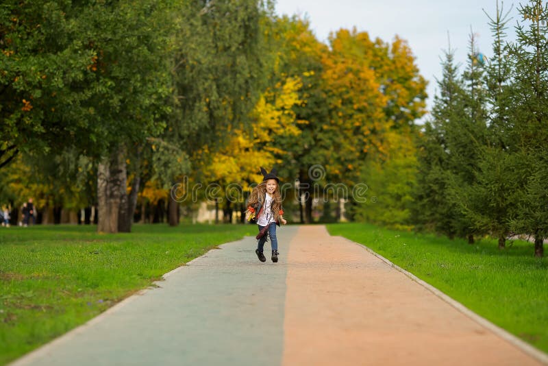 Happy Little Girl Walking in the Park. Stock Image - Image of childhood ...
