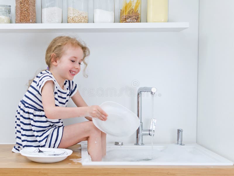 Happy Little Girl Washing the Dishes. Stock Photo - Image of clean ...