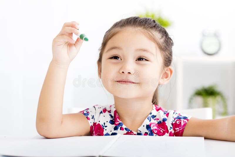 Happy Little Girl Writing in Notebook Stock Photo - Image of school ...