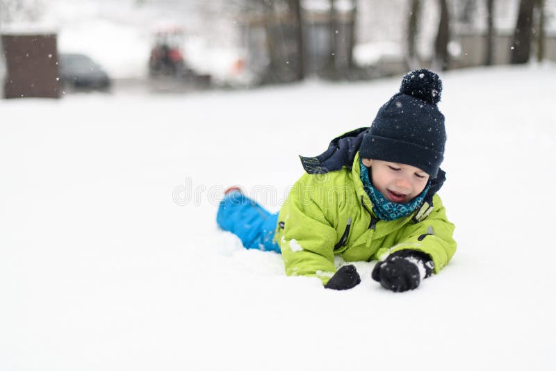 Happy Little Kid is Playing in Snow Stock Image - Image of happiness ...