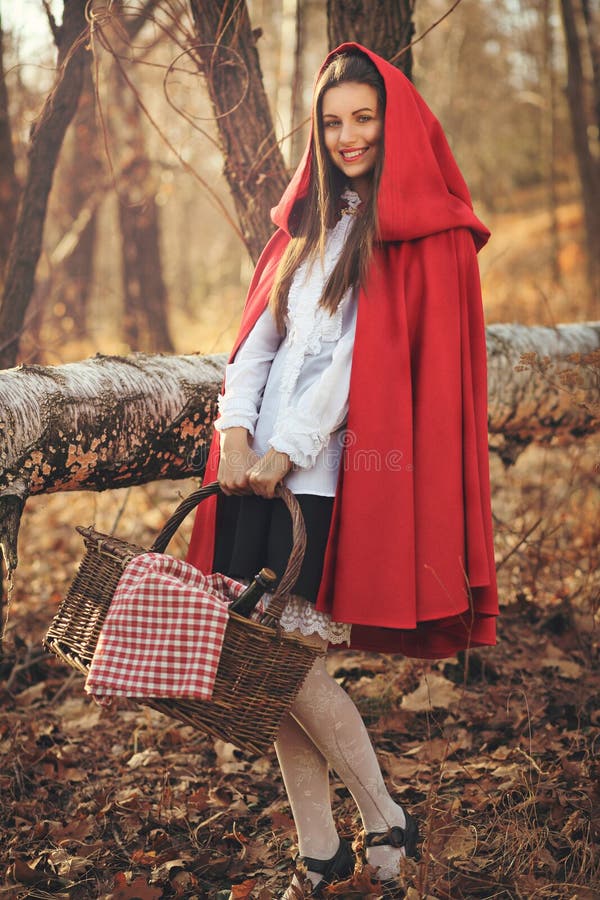Happy Little Red Riding Hood Poses in the Forest Stock Image - Image of ...