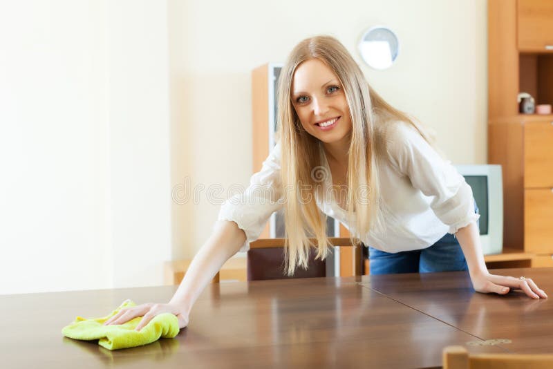 Happy Long-haired Woman Wiping the Table Stock Image - Image of table ...