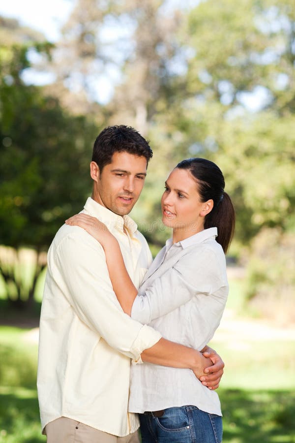 Happy lovers at the beach stock photo. Image of natural - 18702902