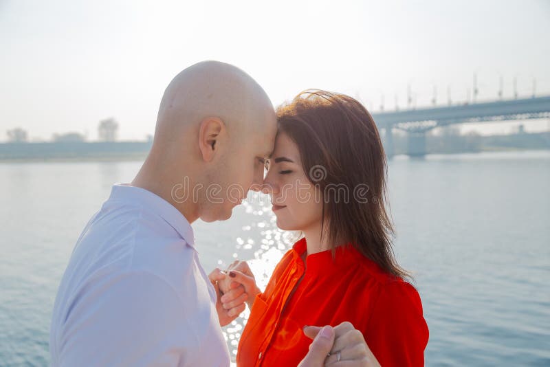 Happy Lovers on the River Bank are Hugging on a Sunny Day. Stock Image ...
