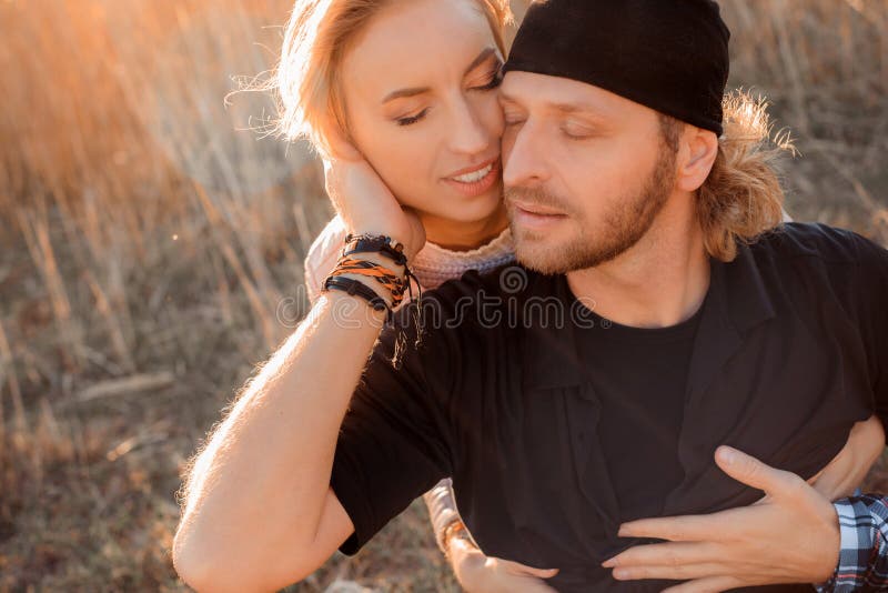 .happy and Loving Couple in the Setting Sun- Image Stock Image - Image ...