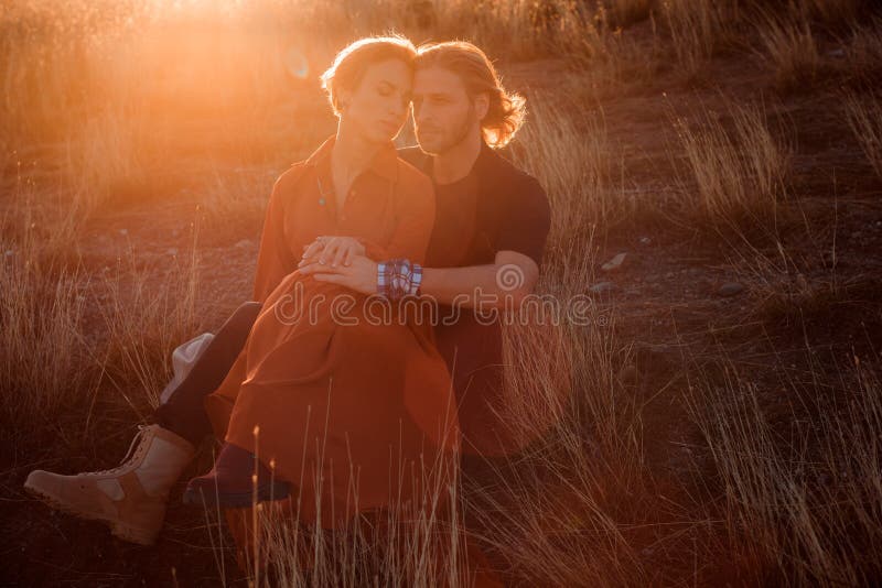 .happy and Loving Couple in the Setting Sun- Image Stock Image - Image ...