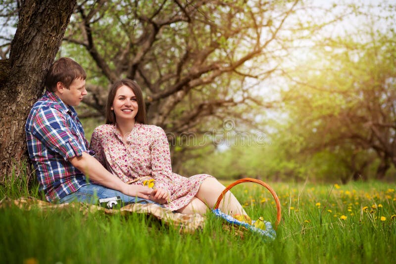 Happy Loving Couple on a Spring Meadow Stock Photo - Image of tree ...