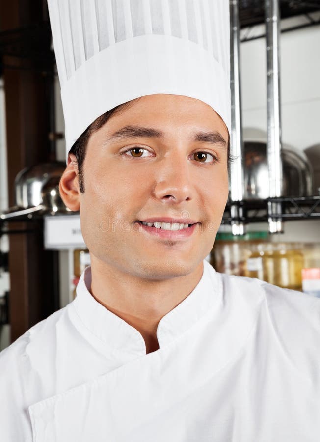 Happy Male Chef in Kitchen stock image. Image of male - 36581619