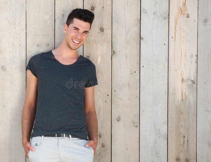 Happy Male Model Standing Outdoors and Smiling Stock Photo - Image of ...