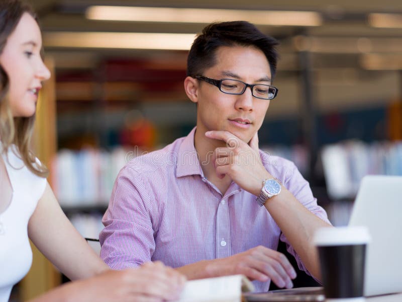 Happy Male Student Working at the Library Stock Image - Image of ...