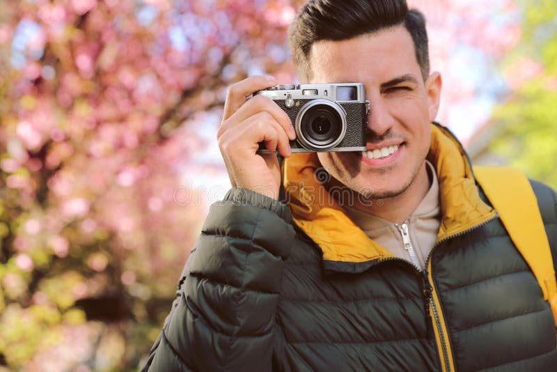 Happy Male Tourist with Camera Outdoors on Spring Day Stock Photo ...