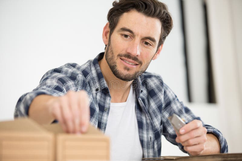 Happy Male Worker Making Boxes Stock Image - Image of boxes, conveyor ...