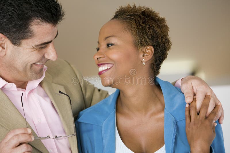 Happy Man with Arm Around Partner Stock Image - Image of black ...