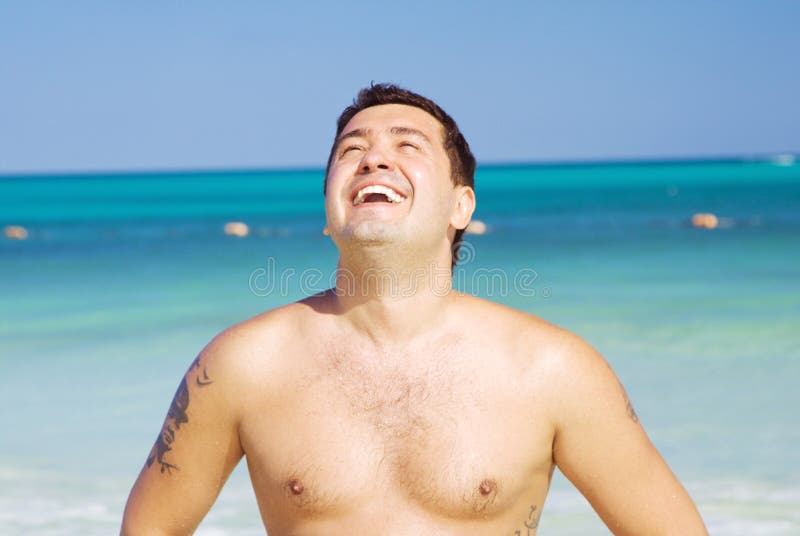 Happy man on the beach stock image. Image of enjoying - 8007161