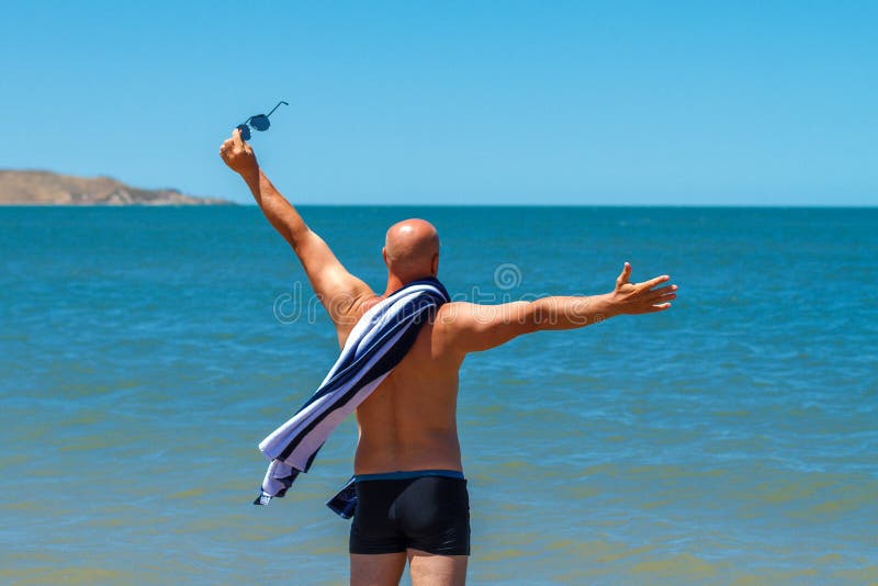 Happy Man on the Beach Enjoys the Freedom of the Concept of Rest and ...