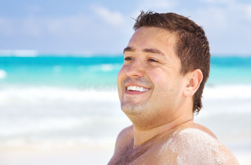 Happy man on the beach stock photo. Image of resort, happy - 41350410