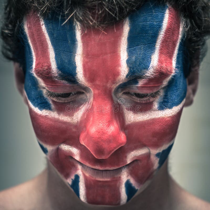 Happy Man with British Flag on Face Looking Down Stock Photo - Image of ...