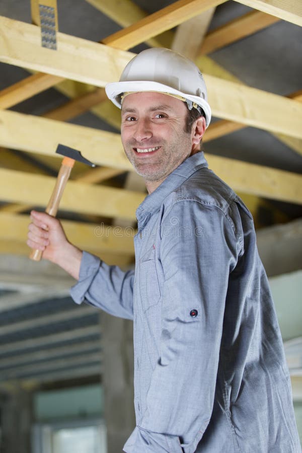 Happy Man Builder Hammer Wood Structure Indoors Stock Image - Image of ...