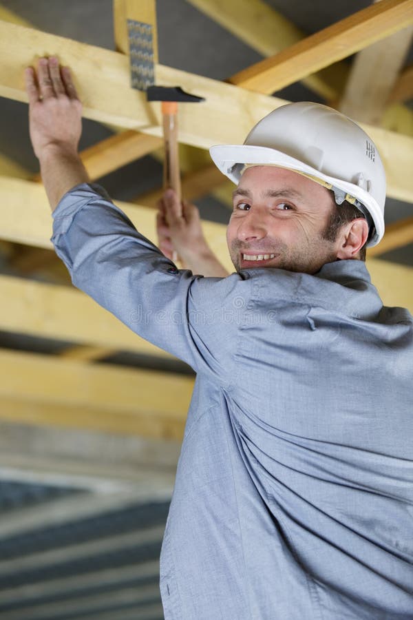 Happy Man Builder Hammer Wood Structure Indoors Stock Image - Image of ...