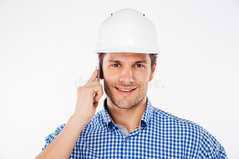 Happy Man Building Engineer in Helmet Talking on Mobile Phone Stock ...
