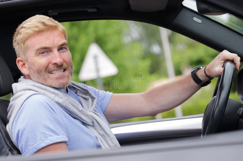 Happy man in car stock photo. Image of town, passengercar - 278506270