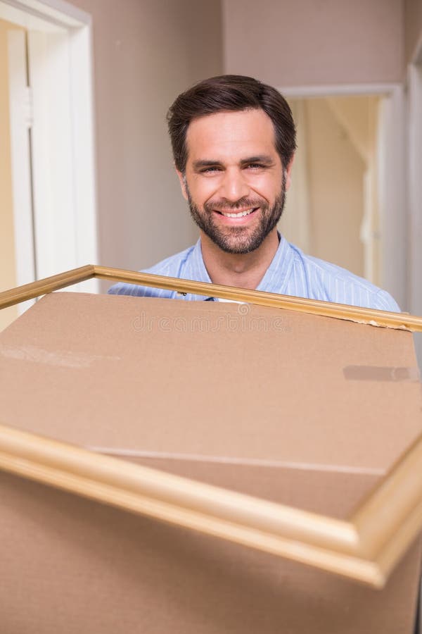 Happy Man Carrying Moving Box Frame Stock Photos - Free & Royalty-Free ...