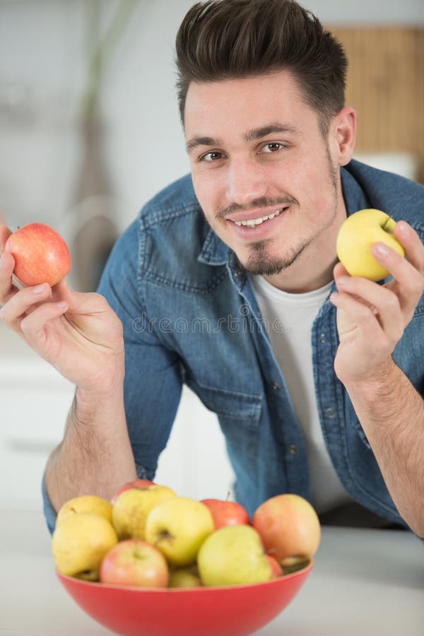 Happy Man Changing Diet To Apples Stock Photo - Image of creative, face ...