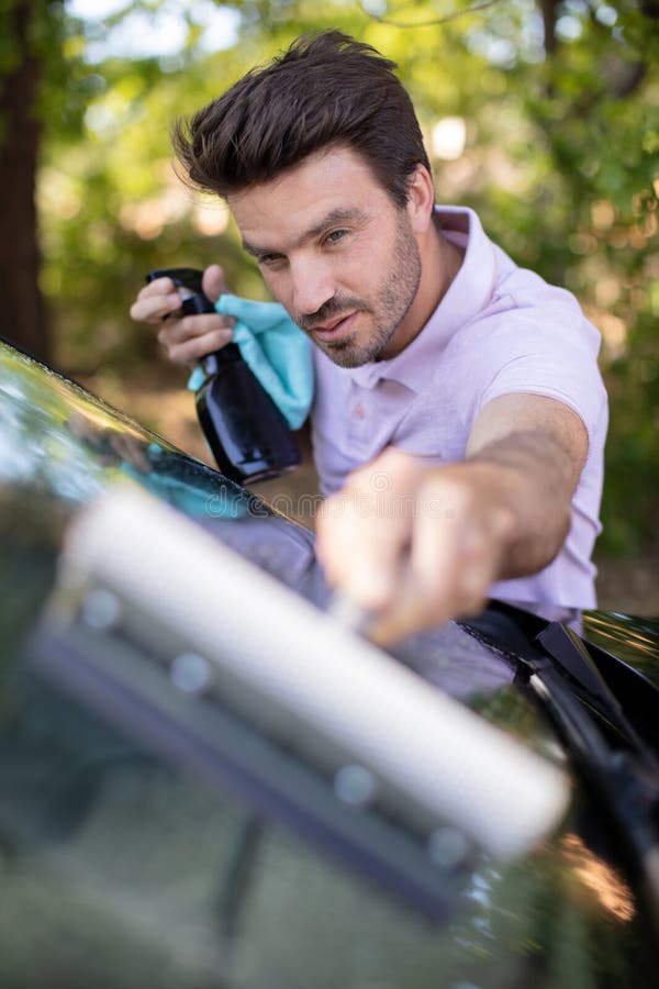 Happy Man Cleaning Car Window Stock Photo - Image of clean ...
