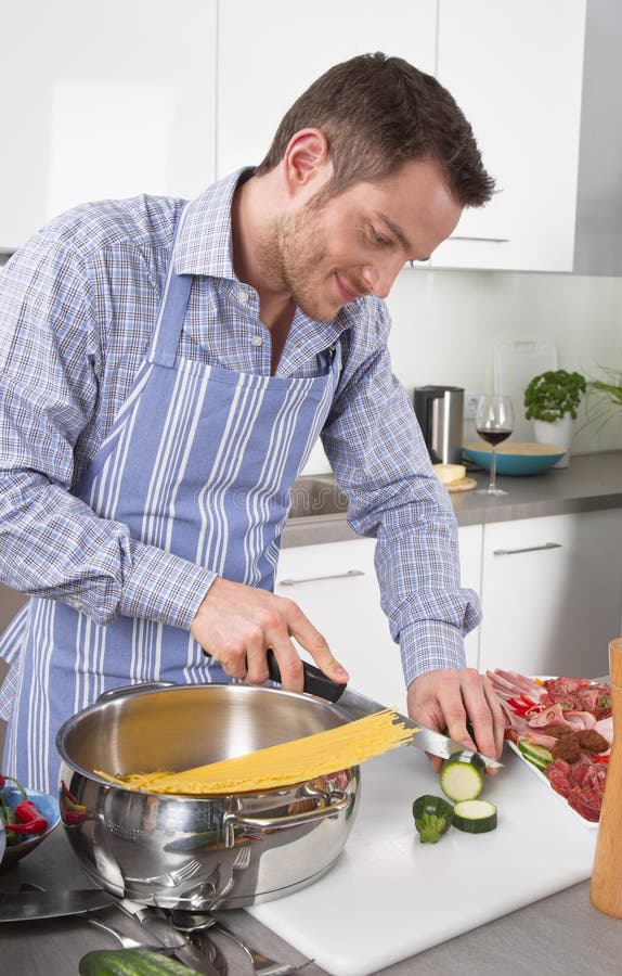 Happy Man Cooking Egg Omelet in the Kitchen Stock Image - Image of ...