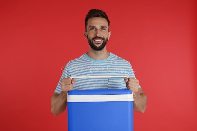 Happy Man with Cool Box on Red Background Stock Image - Image of ...