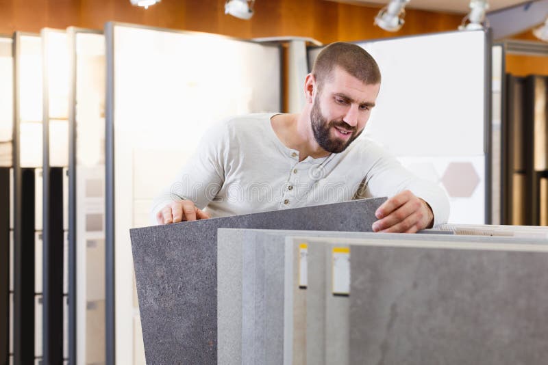 Happy Man Customer Choosing Ceramic Tile Stock Photo - Image of indoors ...