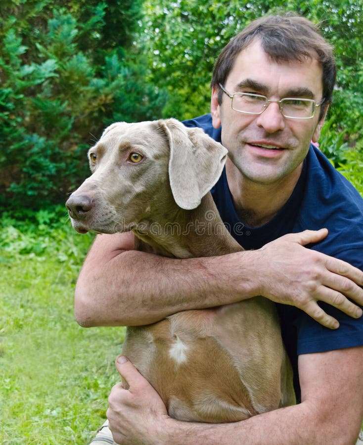 Happy man and dog stock photo. Image of summer, adult - 15937652