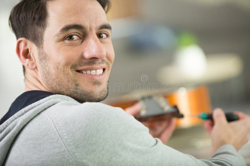 Happy Man Doing Diy at Home Stock Photo - Image of tool, installation ...
