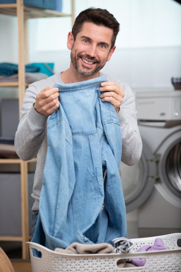 Happy Man Doing Laundry at Home Stock Photo - Image of inside, clothes: 259683756