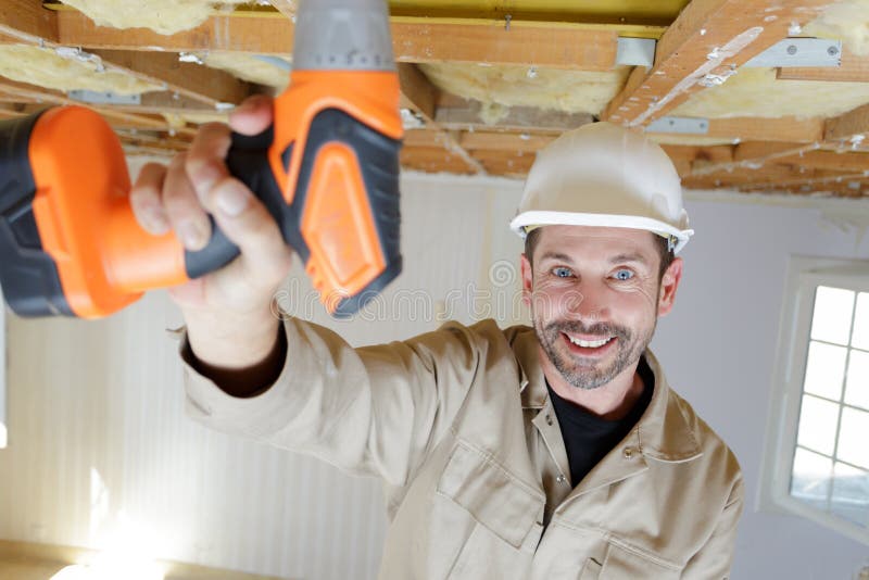Happy Man with Drilling Machine Stock Image - Image of perforation ...
