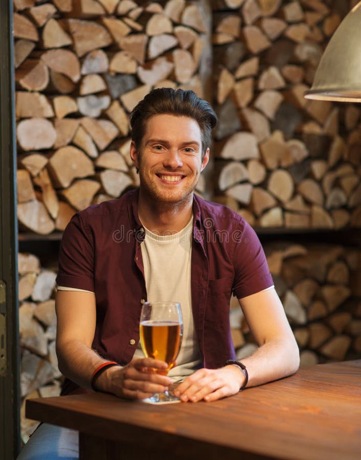 Happy Man Drinking Beer at Bar or Pub Stock Photo - Image of cheerful ...