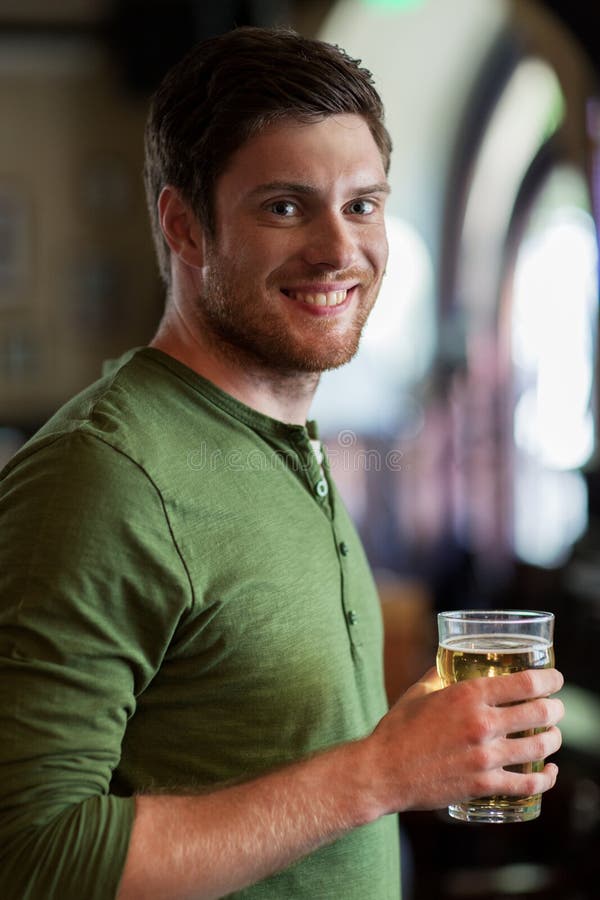 Happy Man Drinking Beer at Bar or Pub Stock Image - Image of drinking ...