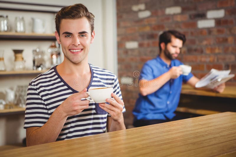 Happy Man Drinking a Coffee Stock Image - Image of cafe, business: 58183619